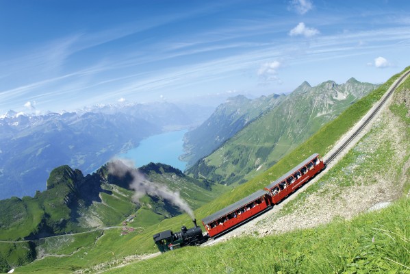 A Train Going Up In The Mountains In Switzerland - Train Going Up A ...
